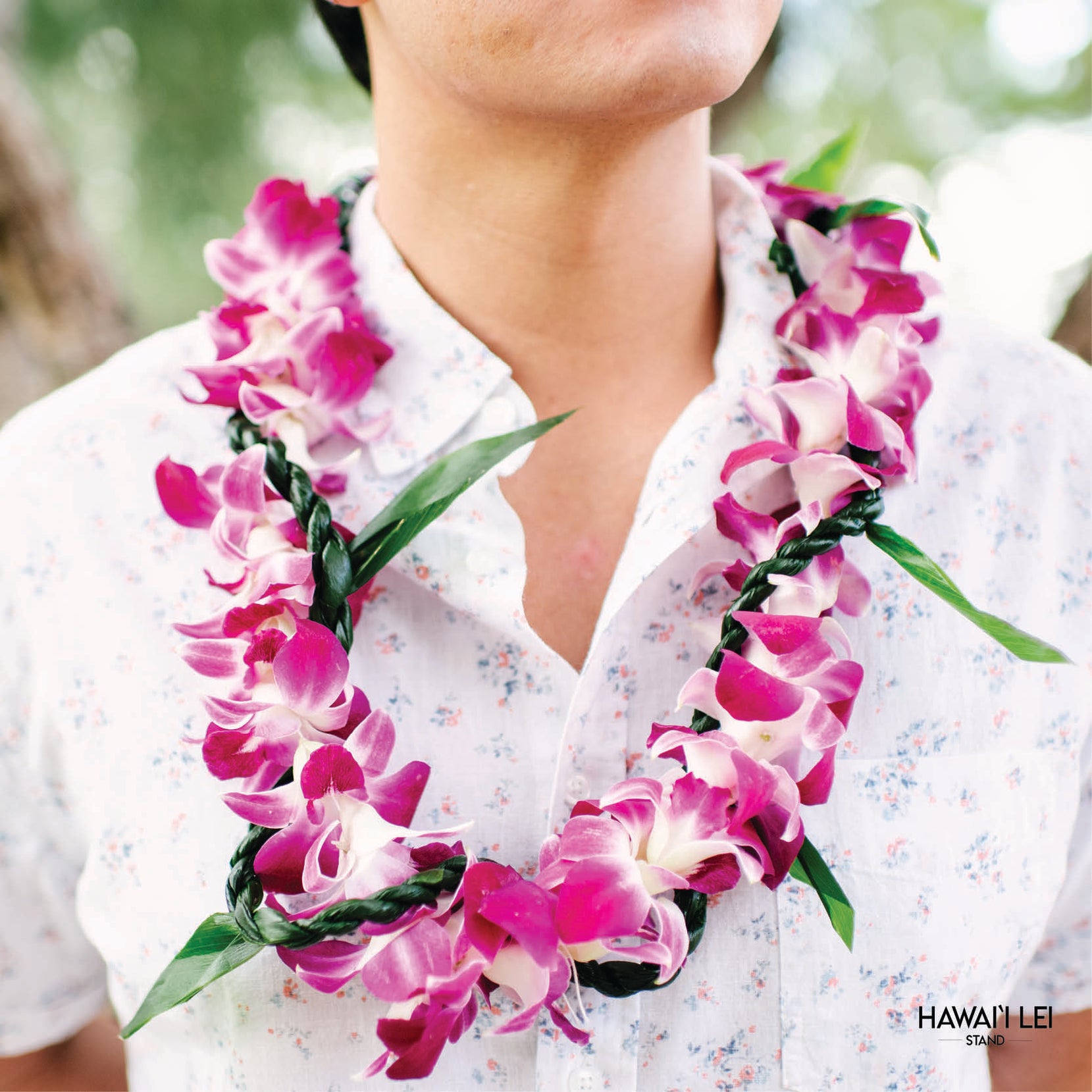 Orchid Wrapped With Ti Leaf Lei